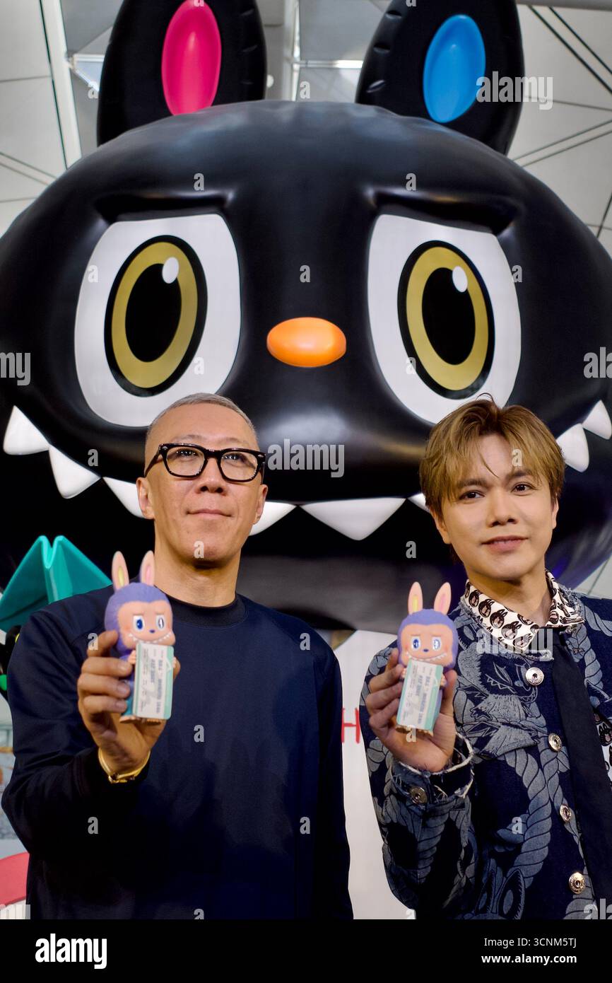 Hong Kong artist Kasing Lung and singer Hins Cheung posing photo at the ...