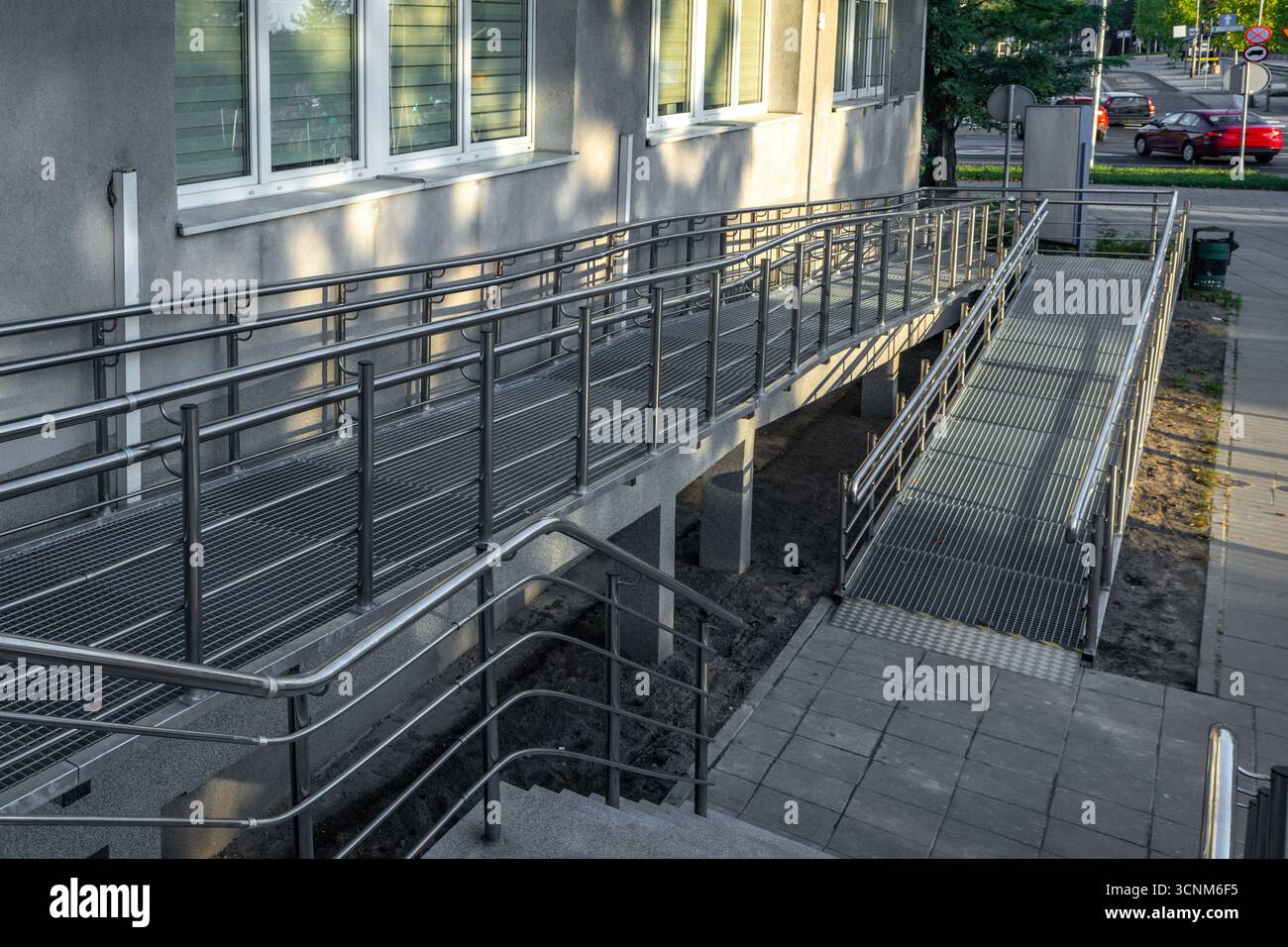 Accessible ramp for disabled people, metal ramp with handrails for ...