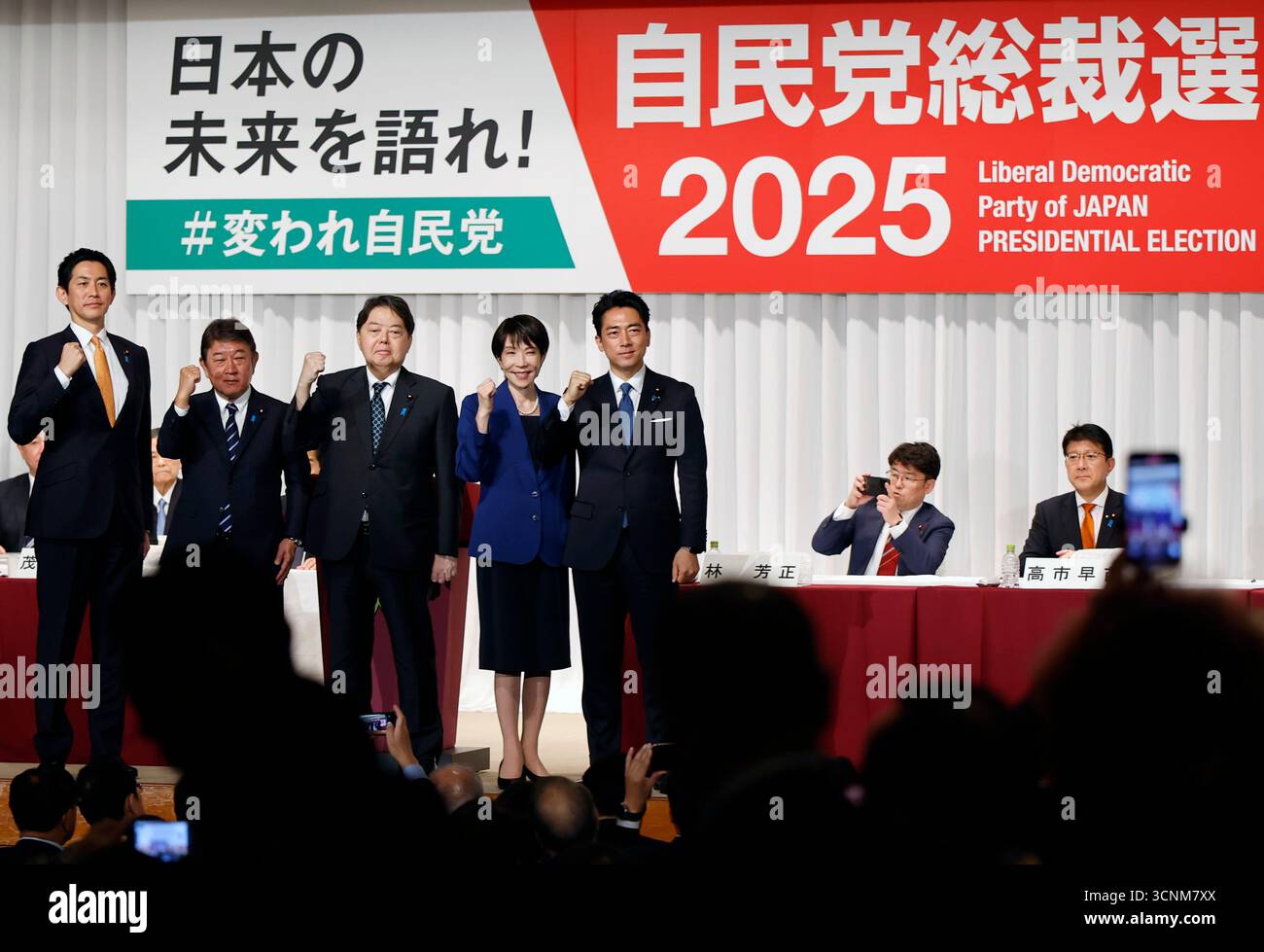 From left, Japan's former Economic Security Minister Takayuki Kobayashi ...