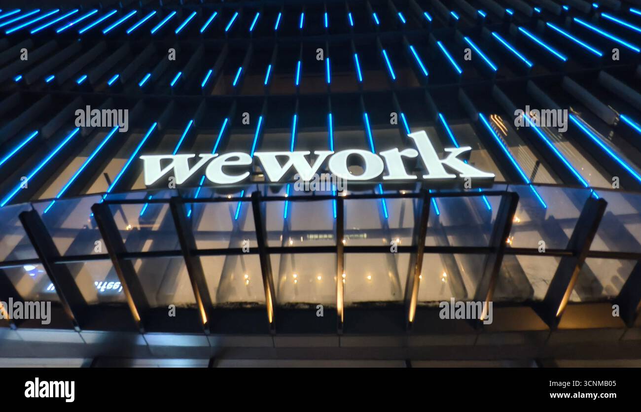 SHANGHAI, CHINA - SEPTEMBER 21, 2025 - Night view of WEWORK Building in ...