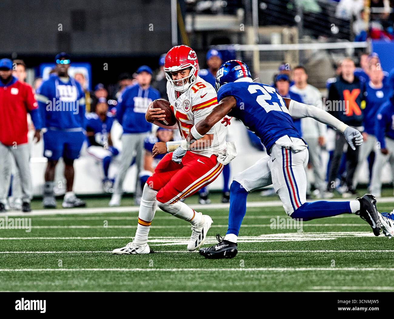 Kansas City Chiefs quarterback Patrick Mahomes (15) takes hit from New ...