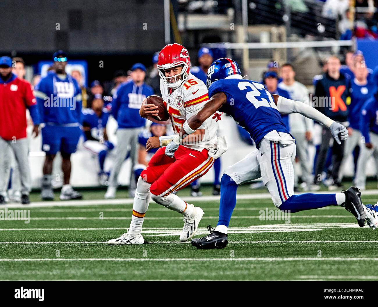 Kansas City Chiefs quarterback Patrick Mahomes (15) takes hit from New ...