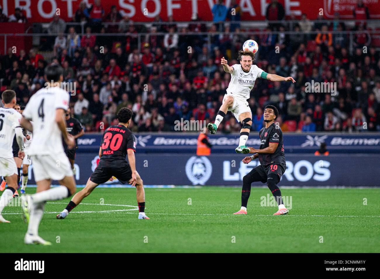 LEVERKUSEN, GERMANY - 21 SEPTEMBER, 2025: Rocco Reitz, Malik Tillman - The Bundesliga match ...