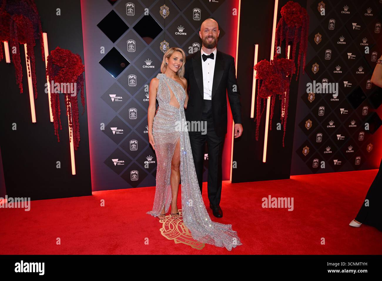 Max Gawn of the Demons (right) and Jessica Todd pose for a photo during the 2025 Brownlow Medal ...