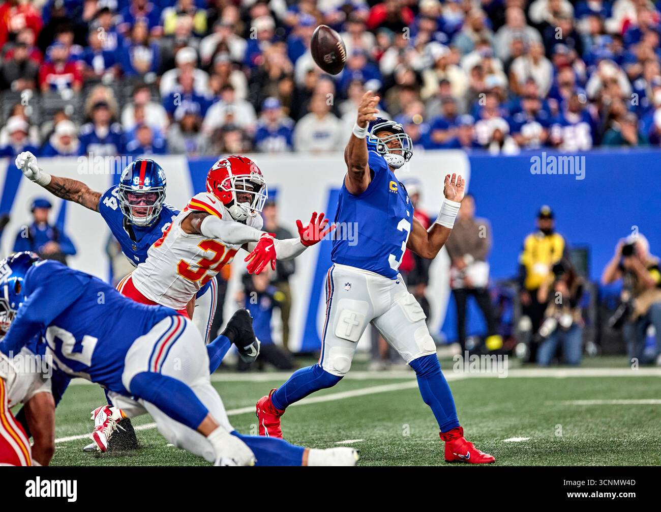 Kansas City Chiefs cornerback Jaylen Watson (35) knocks the ball loose ...