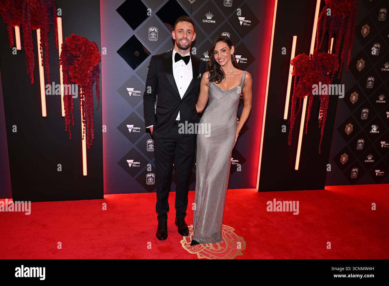 Jack Gunston of the Hawks (left) and Dani Shreeve pose for a photo ...