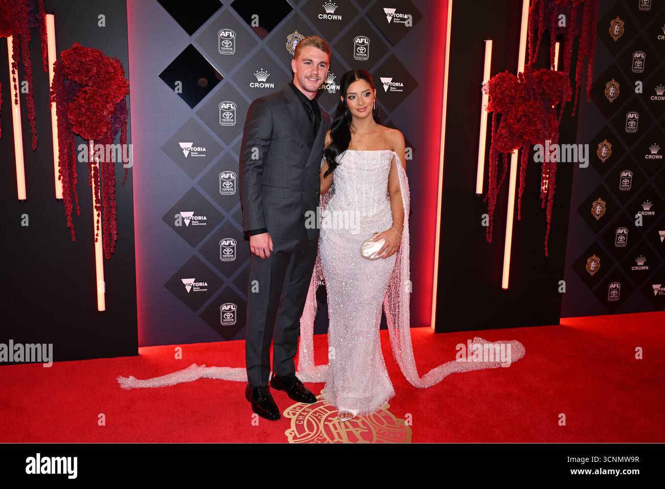 Jason Horne-Francis of Port Adelaide (left) and Isabella Cavallaro pose ...