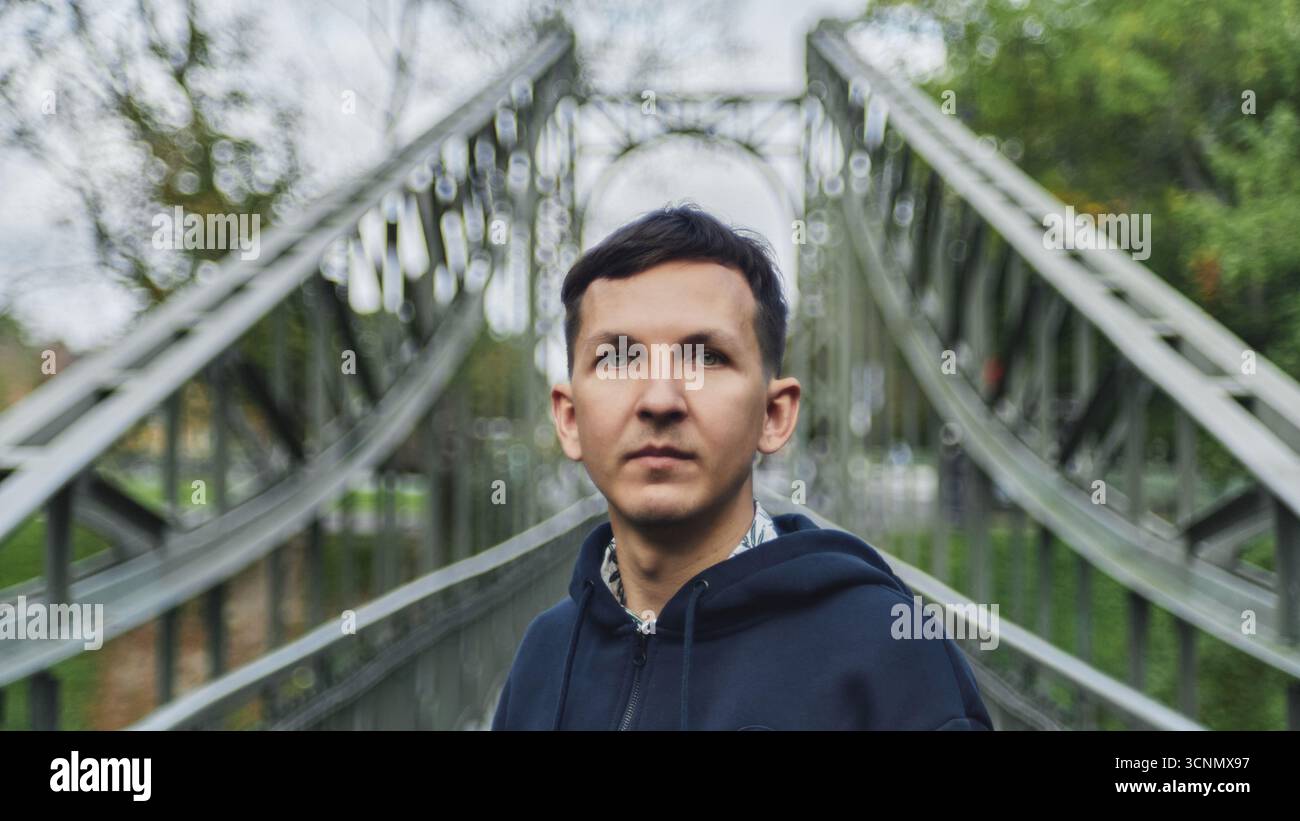 Man stands on bridge surrounded hi-res stock photography and images - Alamy