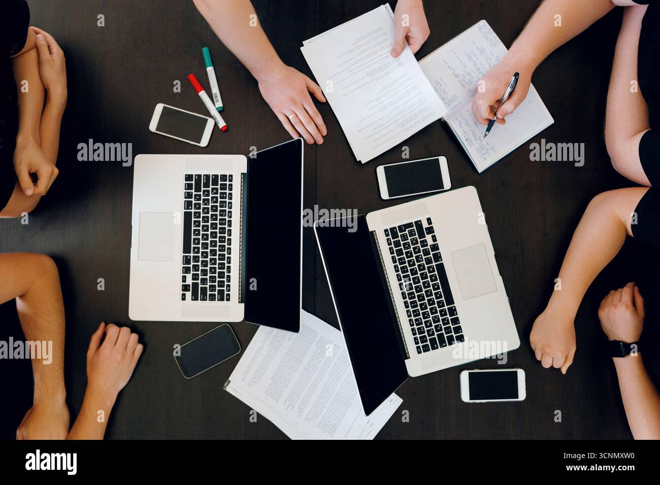 Team Collaboration in Modern Office Setting Stock Photo - Alamy