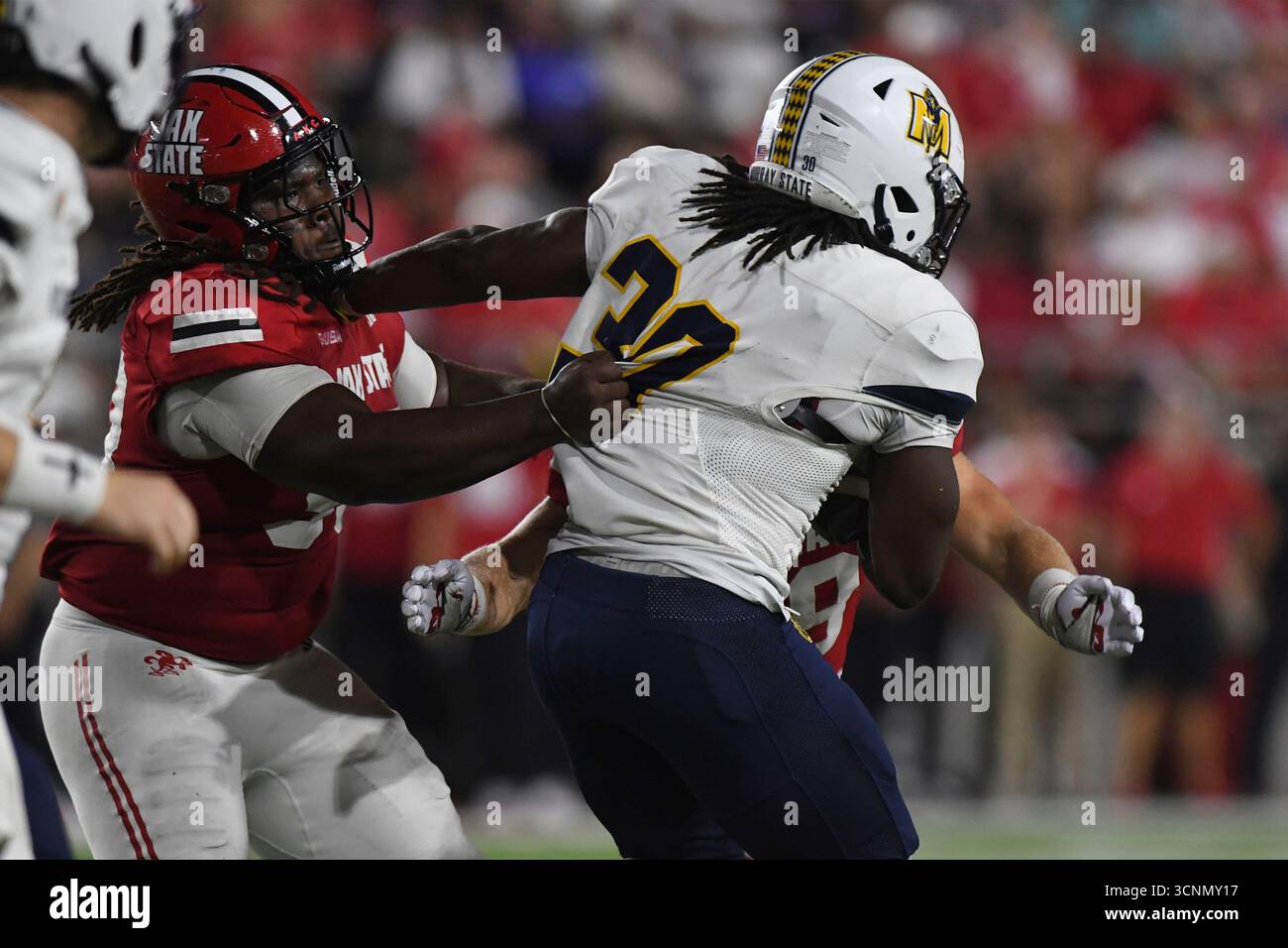 JACKSONVILLE, AL - SEPTEMBER 20: Defensive lineman Talan Carter #92 of ...