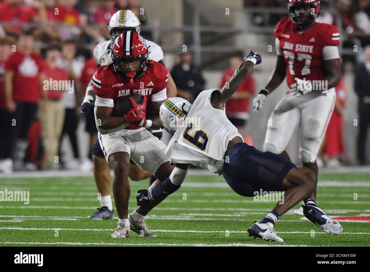 JACKSONVILLE, AL - SEPTEMBER 20: Running back Cam Cook #4 of the ...