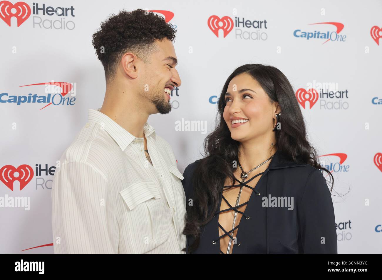 Miguel Harichi and Leah Ketab attend the 2025 iHeartRadio Music Festival at T-Mobile Arena Stock ...