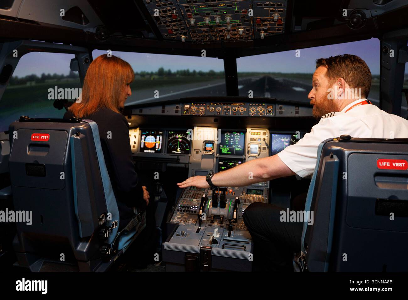 Chancellor of the Exchequer Rachel Reeves sits in a flight simulator ...