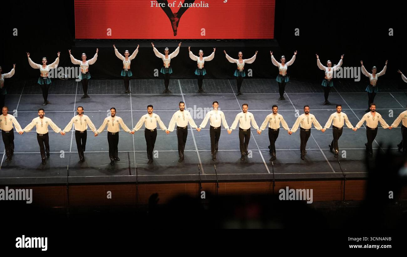Members of Fire of Anatolia, also known as Anadolu Ateşi, bow to the ...