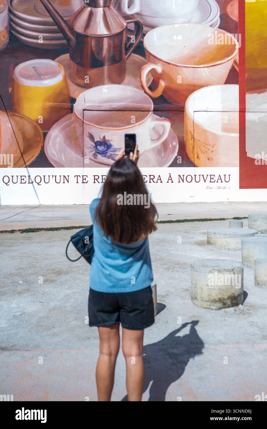 Artistic intervention in a mural by the French artist Remi Tournier on ...