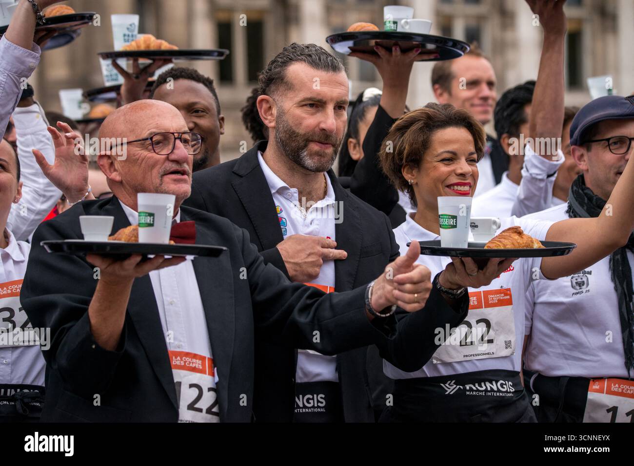 Participants take part in the traditional Waiters Race (Course des ...