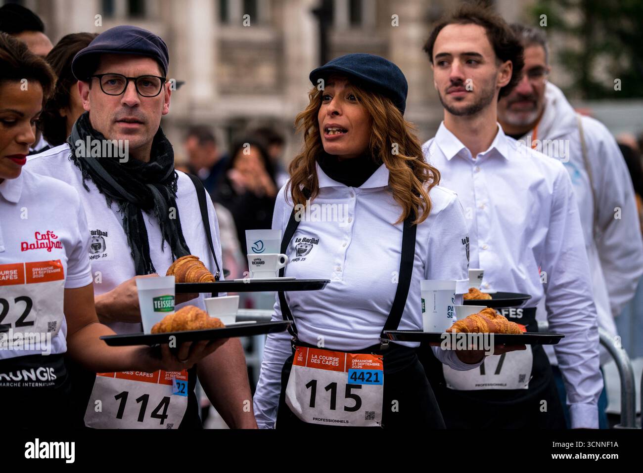 Participants take part in the traditional Waiters Race (Course des ...