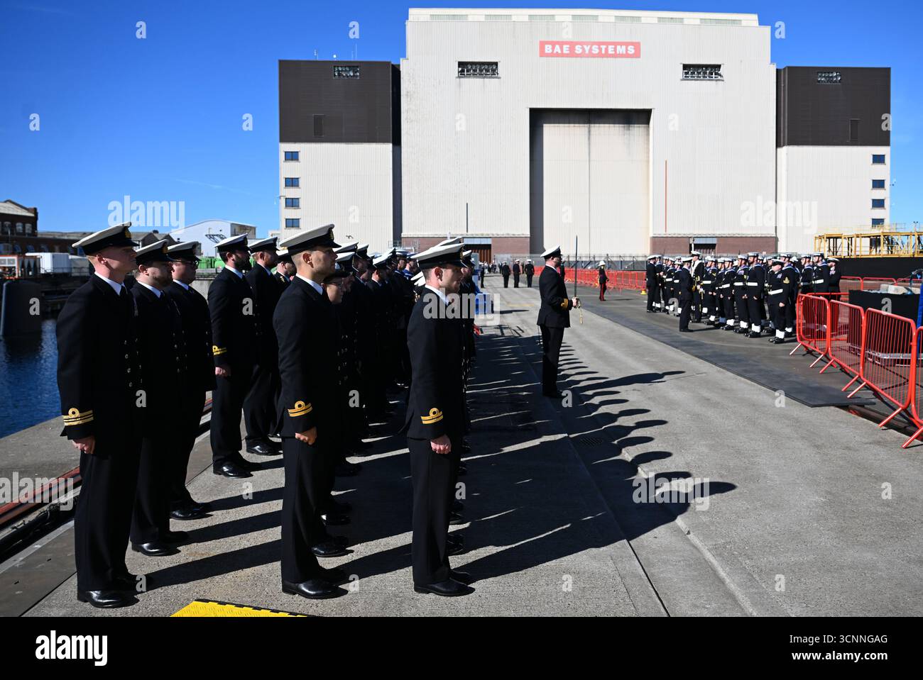 Officers stand on duty during a Commissioning Ceremony for HMS ...