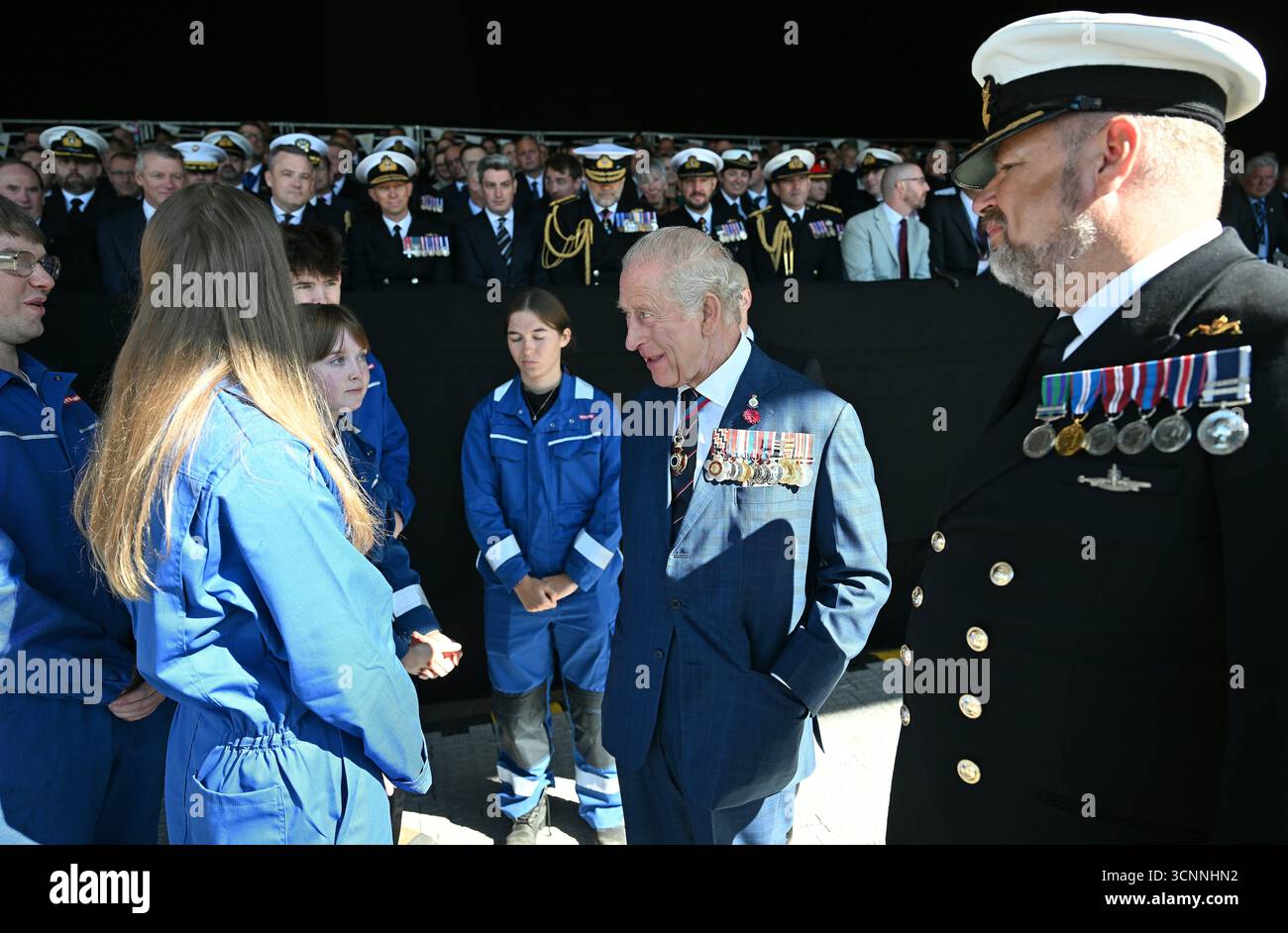 King Charles III talks with apprentices from BAE Systems during a ...