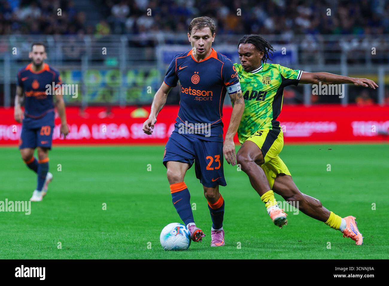 Nicolo Barella of FC Internazionale competes for the ball with Woyo ...