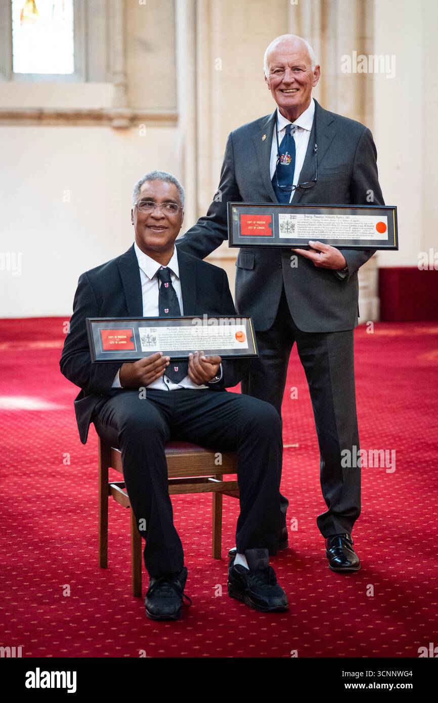 Boxer Michael Watson and boxing promoter Barry Hearn pose after they ...