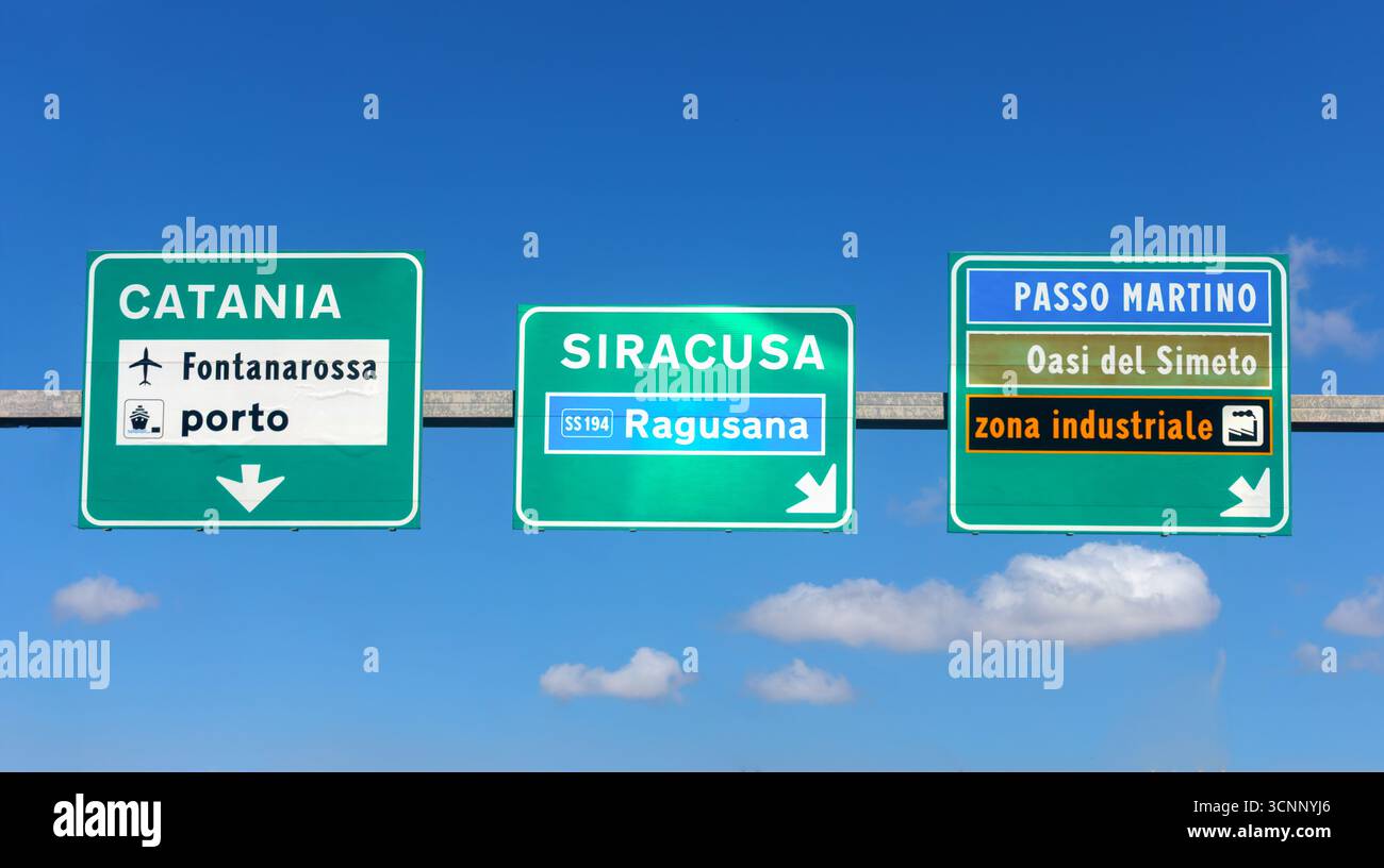 Road signs pointing to Catania Airport, Syracuse, and Porto. Catania ...