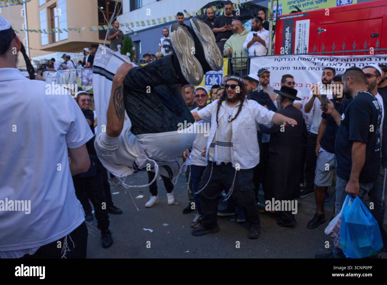 Orthodox Jews dance at the tomb of Rabbi Nachman, the great grandson of ...