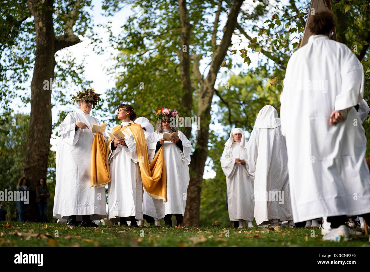 Members of the Druid Order prepare to perform a ceremony to celebrate ...