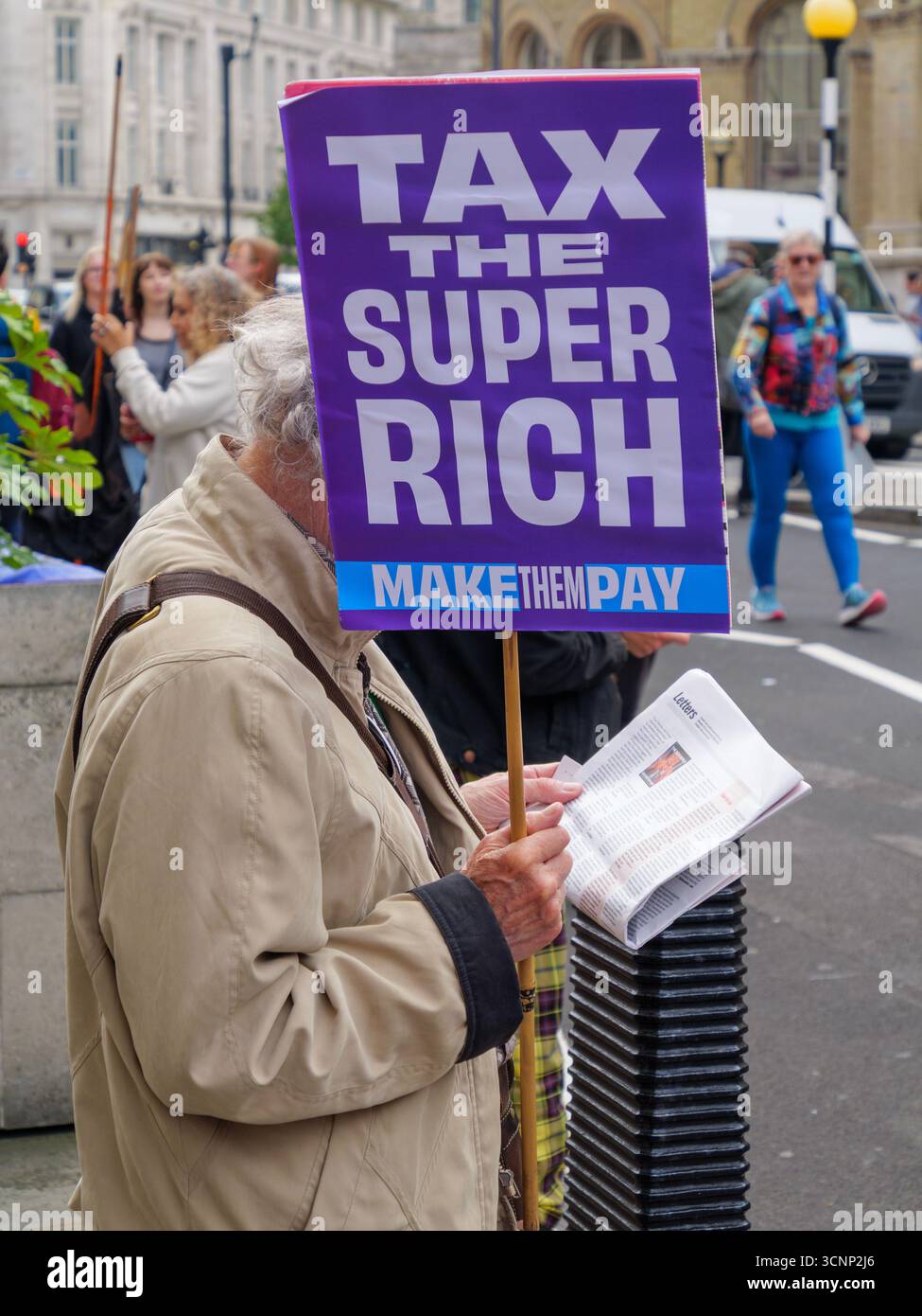 20 September 2025, Portland Place, London, UK. Protester with placard ...