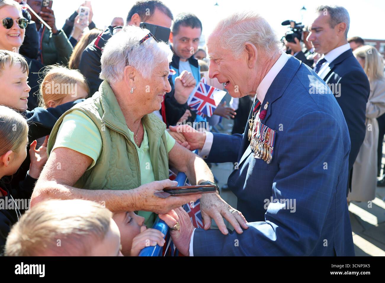King Charles III meets members of the public during a visit to Barrow ...