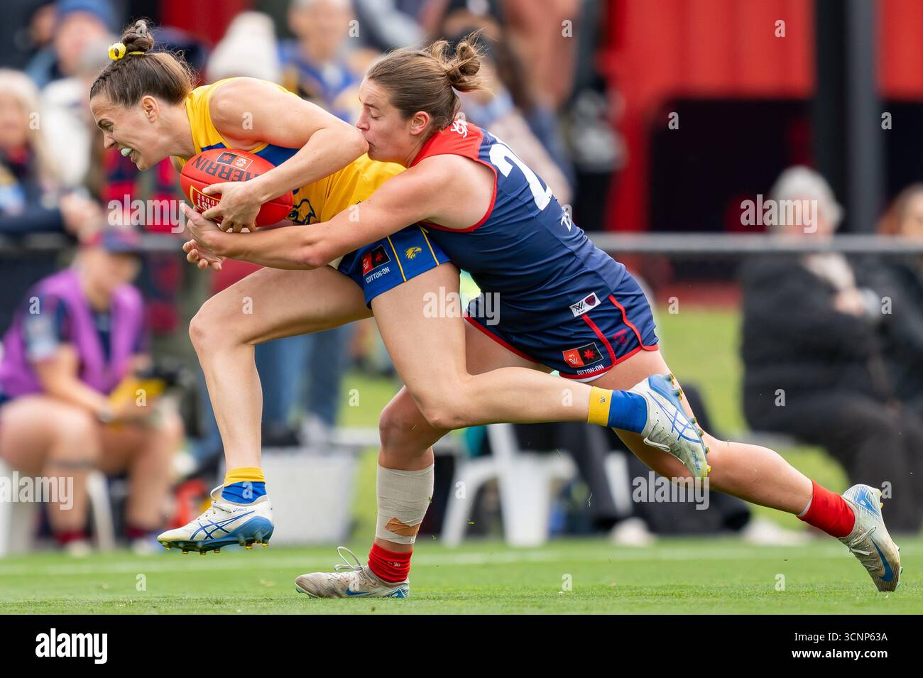 Maggie Mahony of Melbourne FC (R) and Jessica Rentsch of the West Coast ...