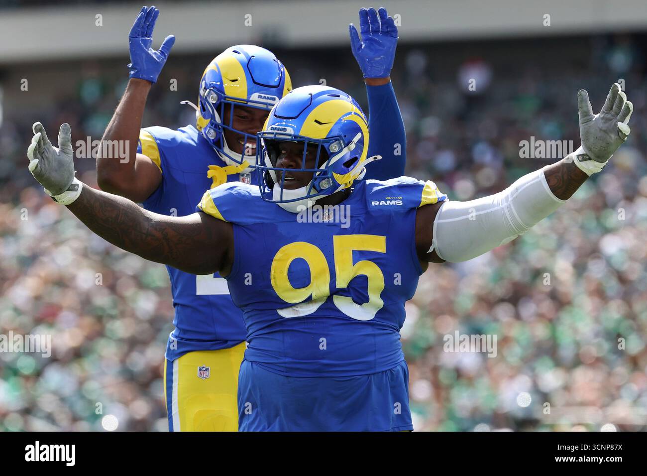 Los Angeles Rams defensive tackle Poona Ford (95) celebrates a sack ...