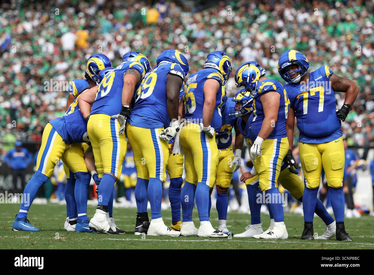 Los Angeles Rams offense huddles during the first half of an NFL ...