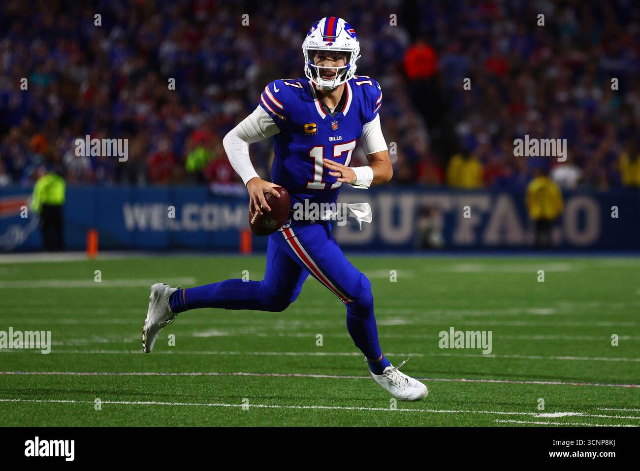 Buffalo Bills quarterback Josh Allen (17) runs with the ball during the ...