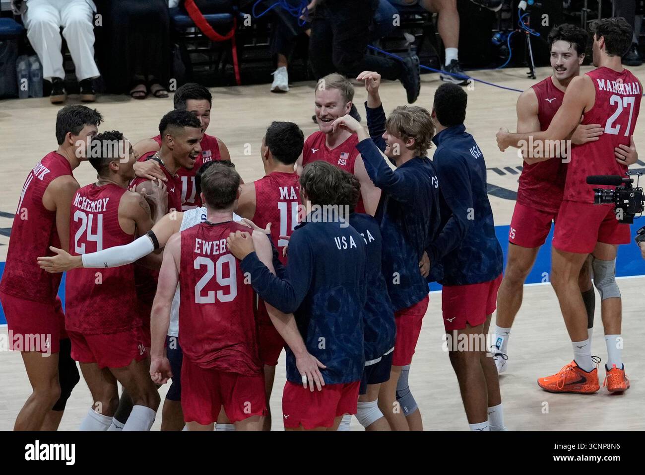 USA team celebrate after winning against Slovenia during their round of ...