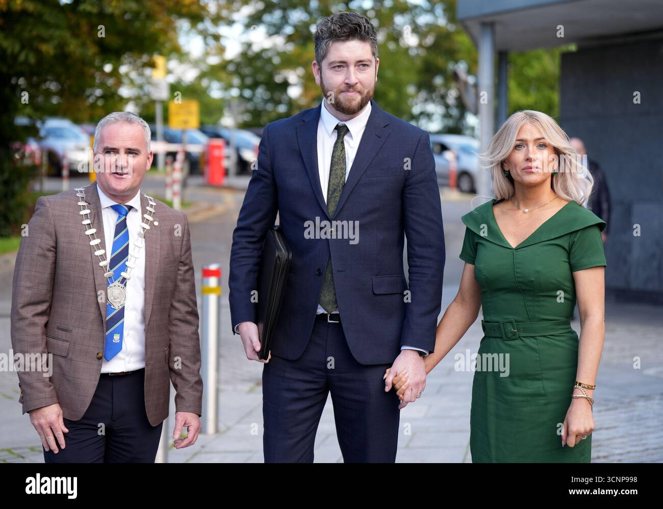 Gareth Sheridan (centre), independent presidential candidate, and his ...