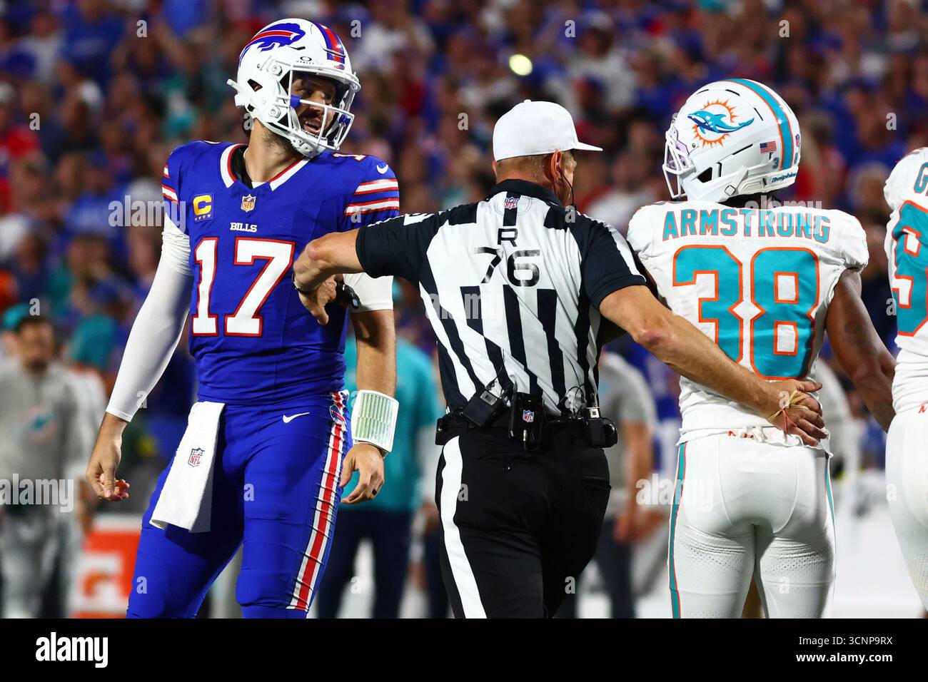 Buffalo Bills quarterback Josh Allen (17) and Miami Dolphins cornerback ...