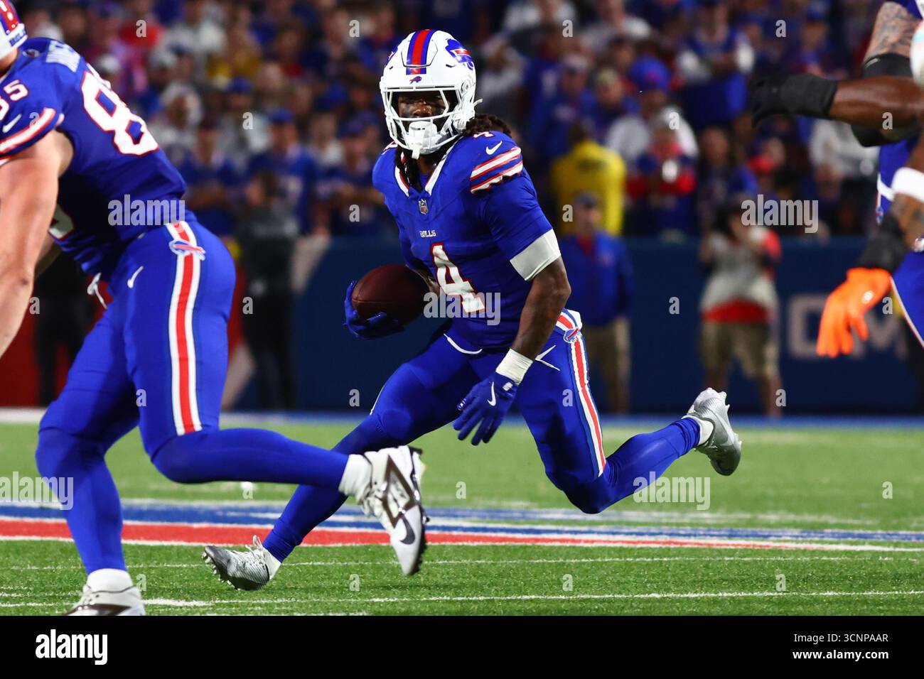 Buffalo Bills running back James Cook (4) carries the ball during the ...