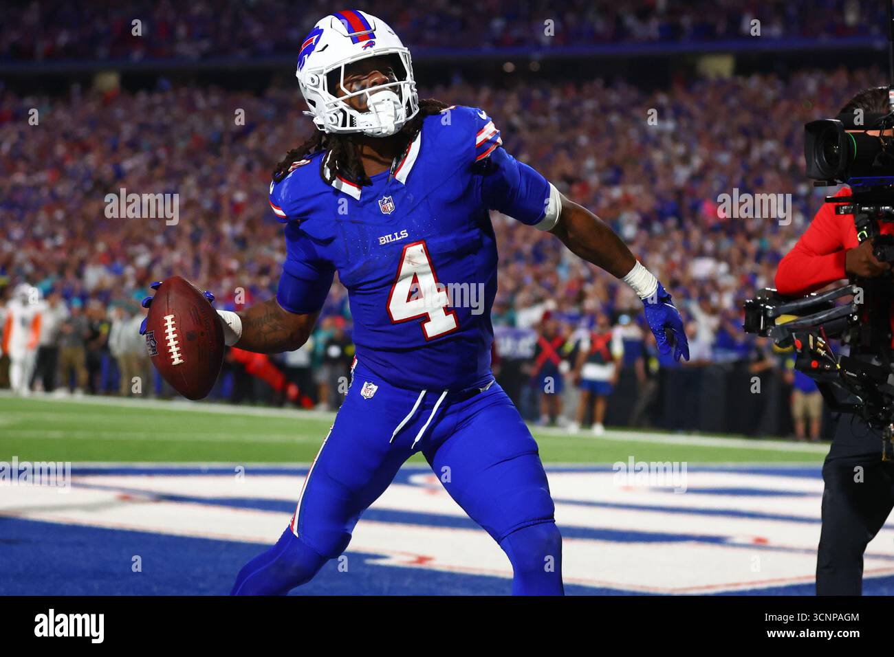 Buffalo Bills running back James Cook (4) celebrates his touchdown ...
