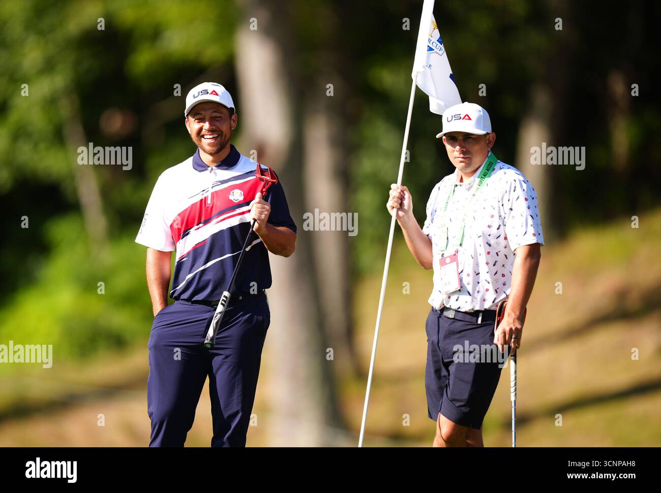 USA's Xander Schauffele (left) and caddie Austin Kaiser at the Bethpage ...