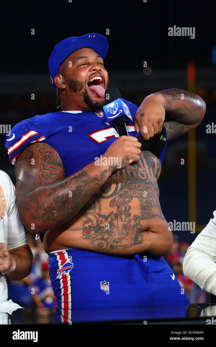 Buffalo Bills offensive tackle Dion Dawkins (73) pulls his jersey up on ...