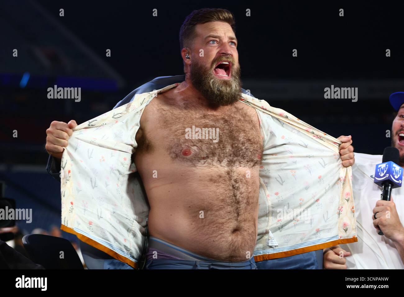 Host Ryan Fitzpatrick takes off his shirt on the set of TNF on Prime ...