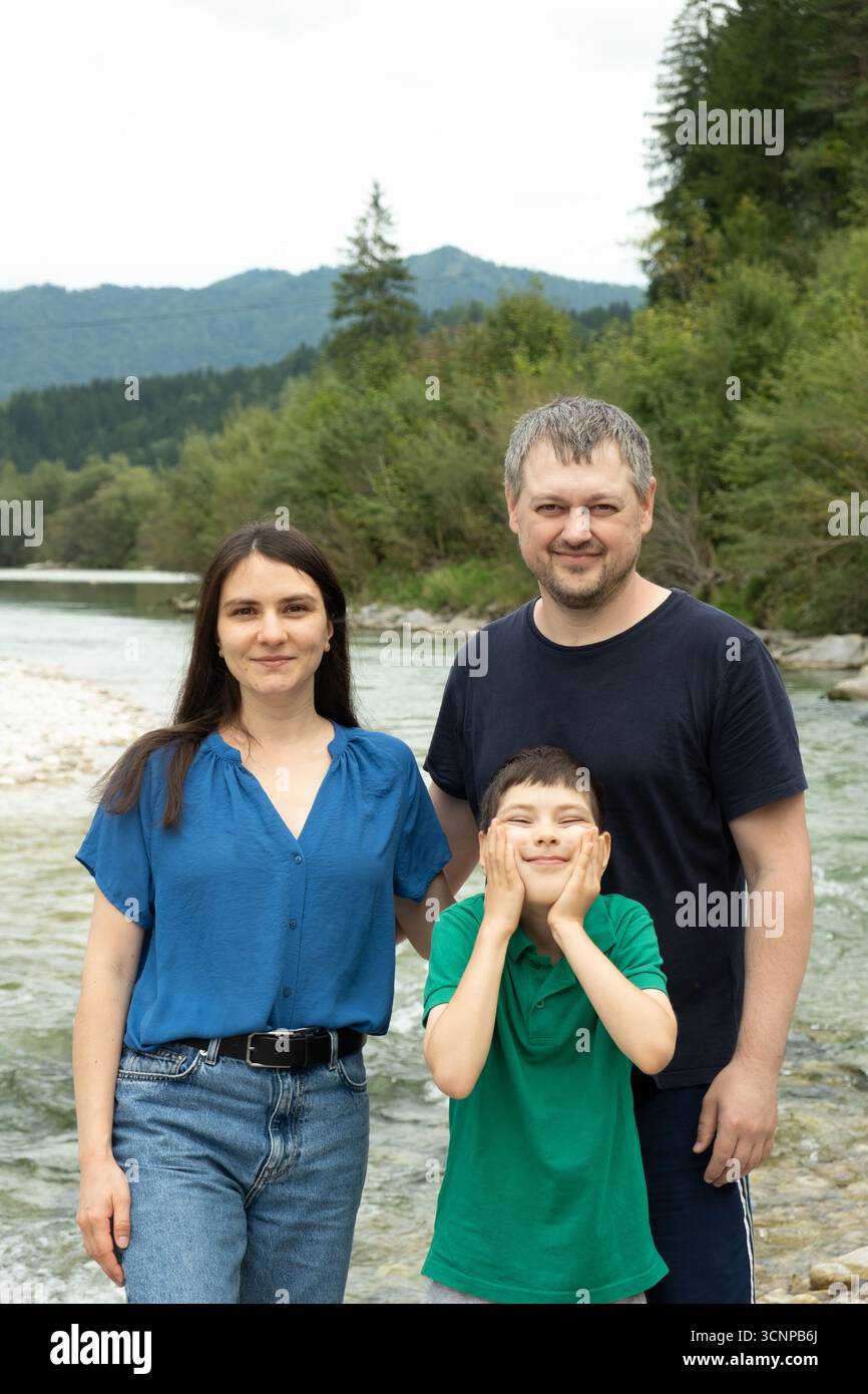 Loving Family with Mother Father and Kid Spending Time Outdoors Stock ...