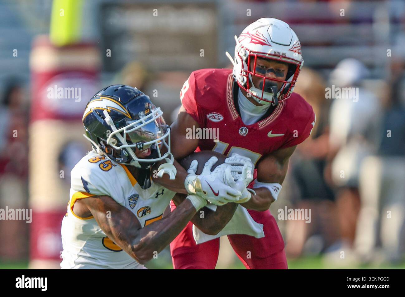 Florida State defensive back Jeremiah Wilson (19), right, intercepts a ...