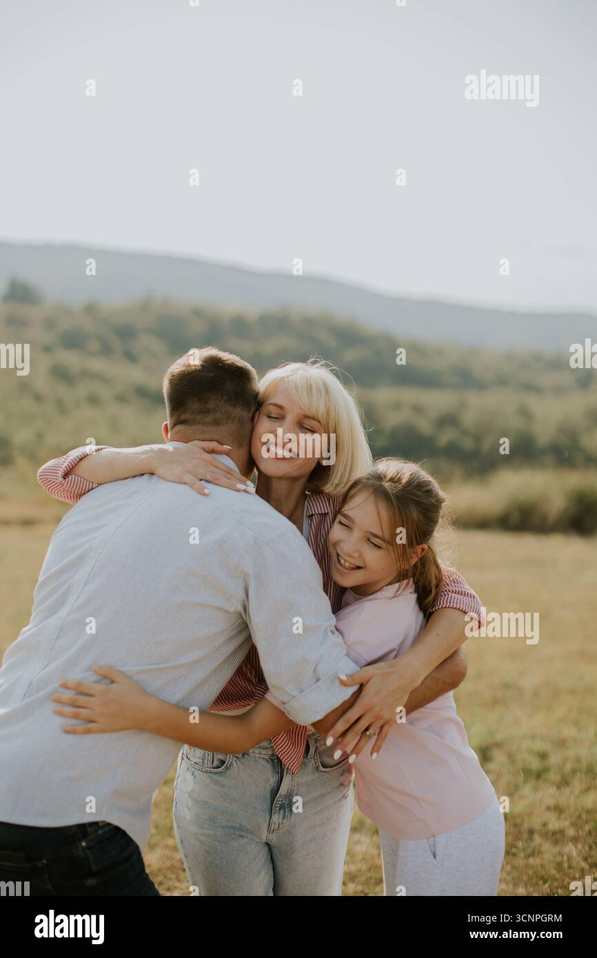 Joyful family shares warm hi-res stock photography and images - Alamy