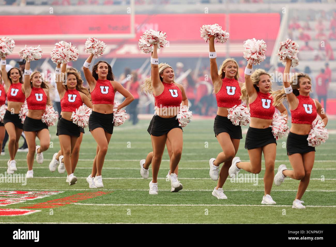 Utah cheerleaders perform during an NCAA college football game Saturday ...