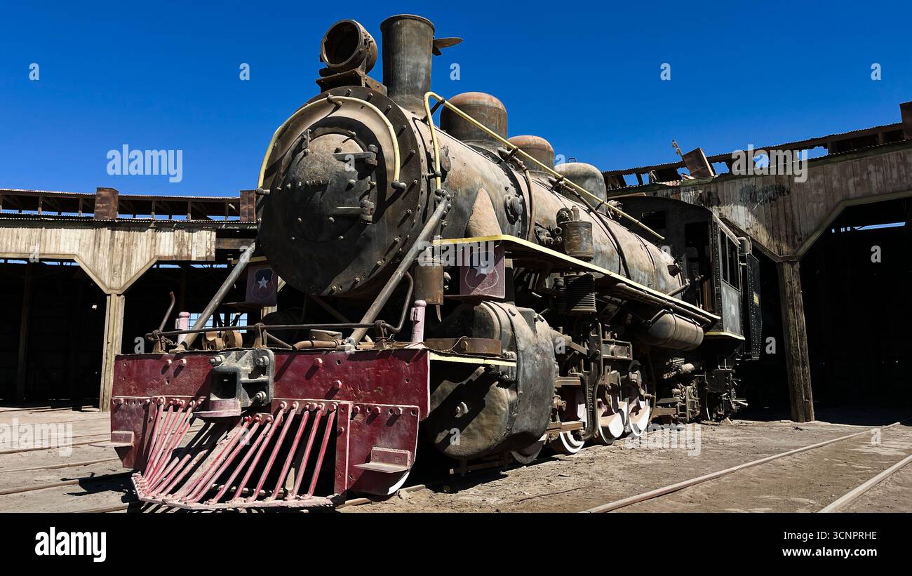 Photo of old steam locomotive in Baquedano Railway Museum in Chile. In ...
