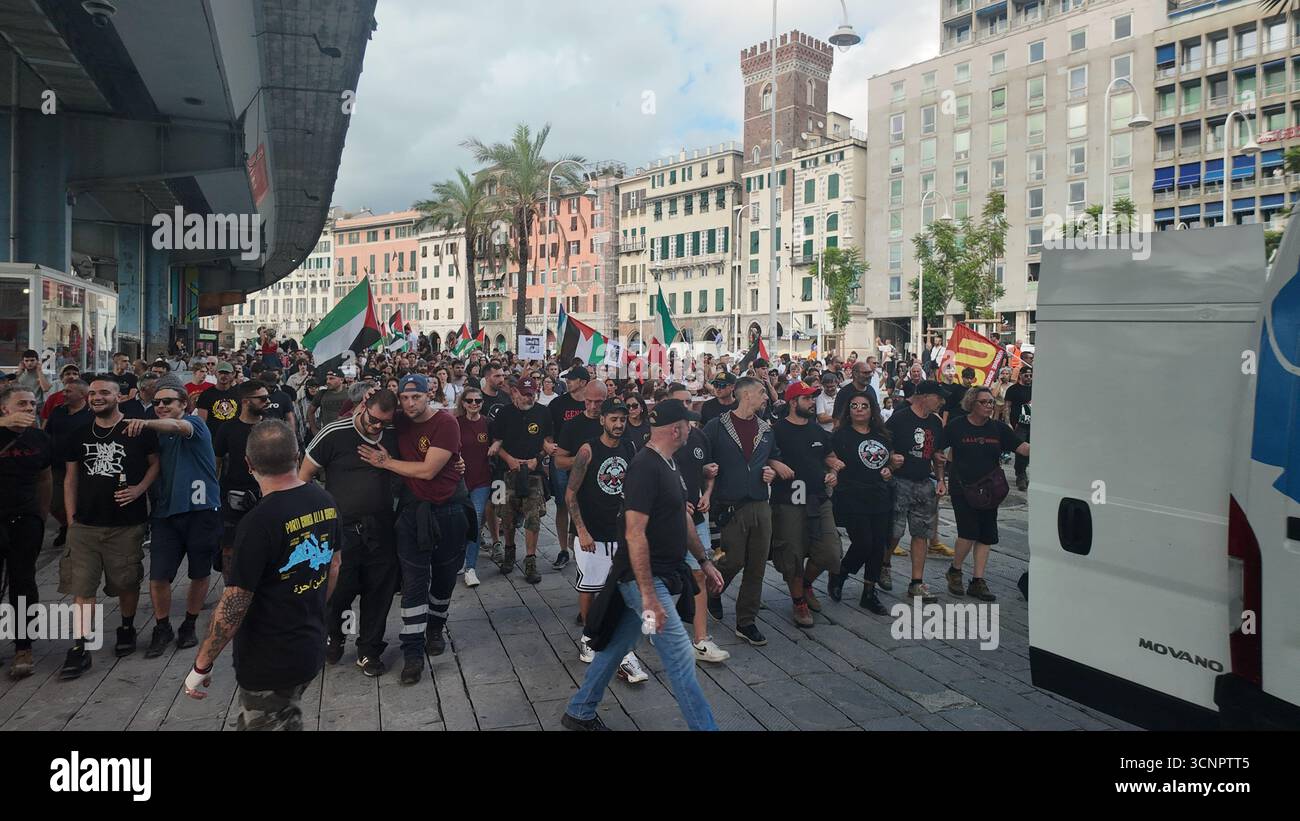 Genoa, Italy. 22 September 2025. Demonstrators march with flags and ...