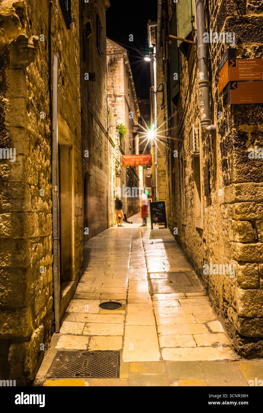 Split, Croatia – Narrow historic alley at night in Split Old Town Stock ...