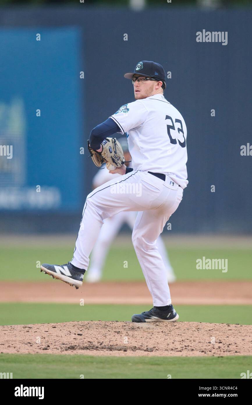 Asheville Tourists starting pitcher Dylan Howard (23) delivers a pitch ...